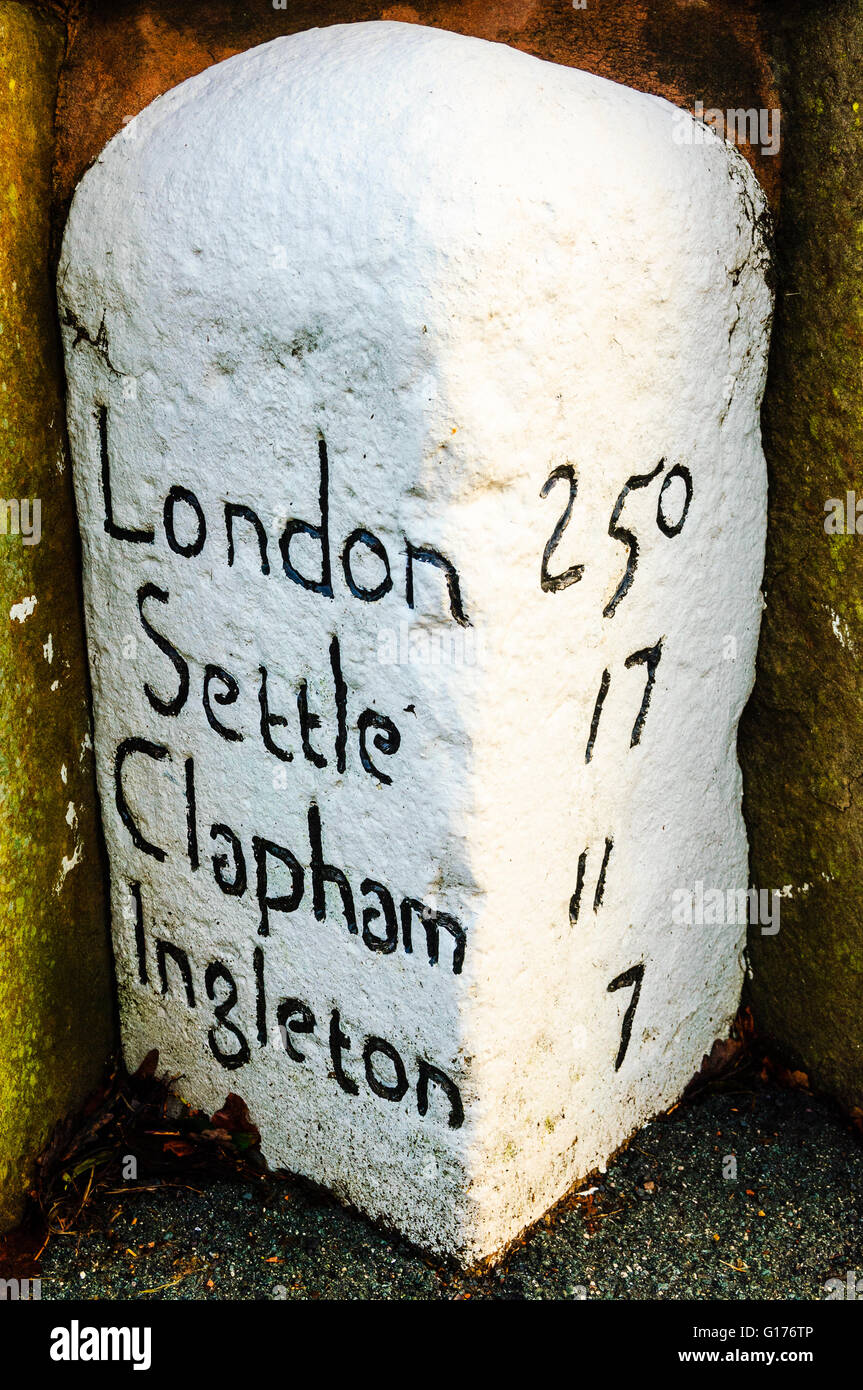Old milestone on road hi-res stock photography and images - Alamy
