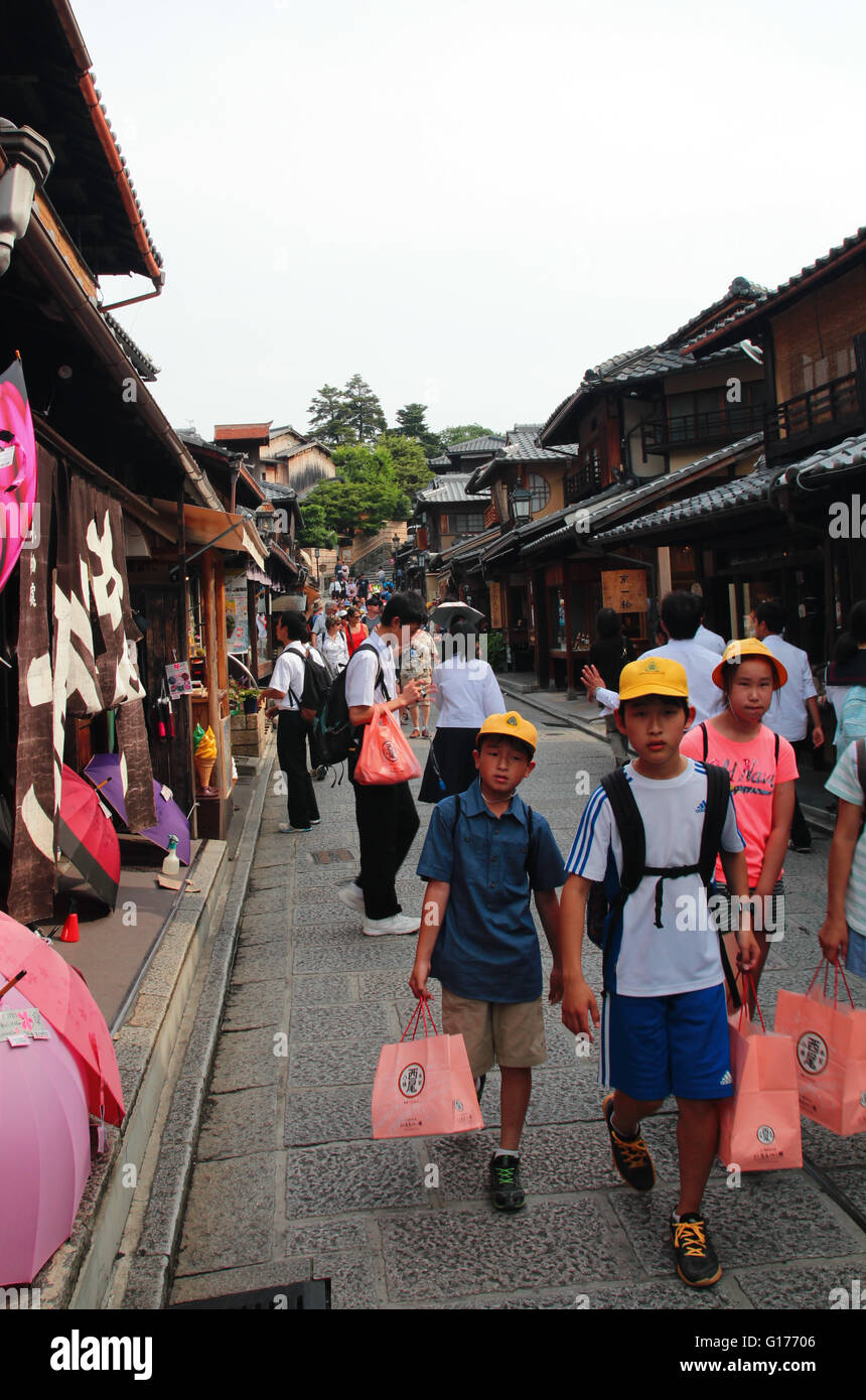 Crowd of visitors and tourists visits very traditional Kyoto street at ...