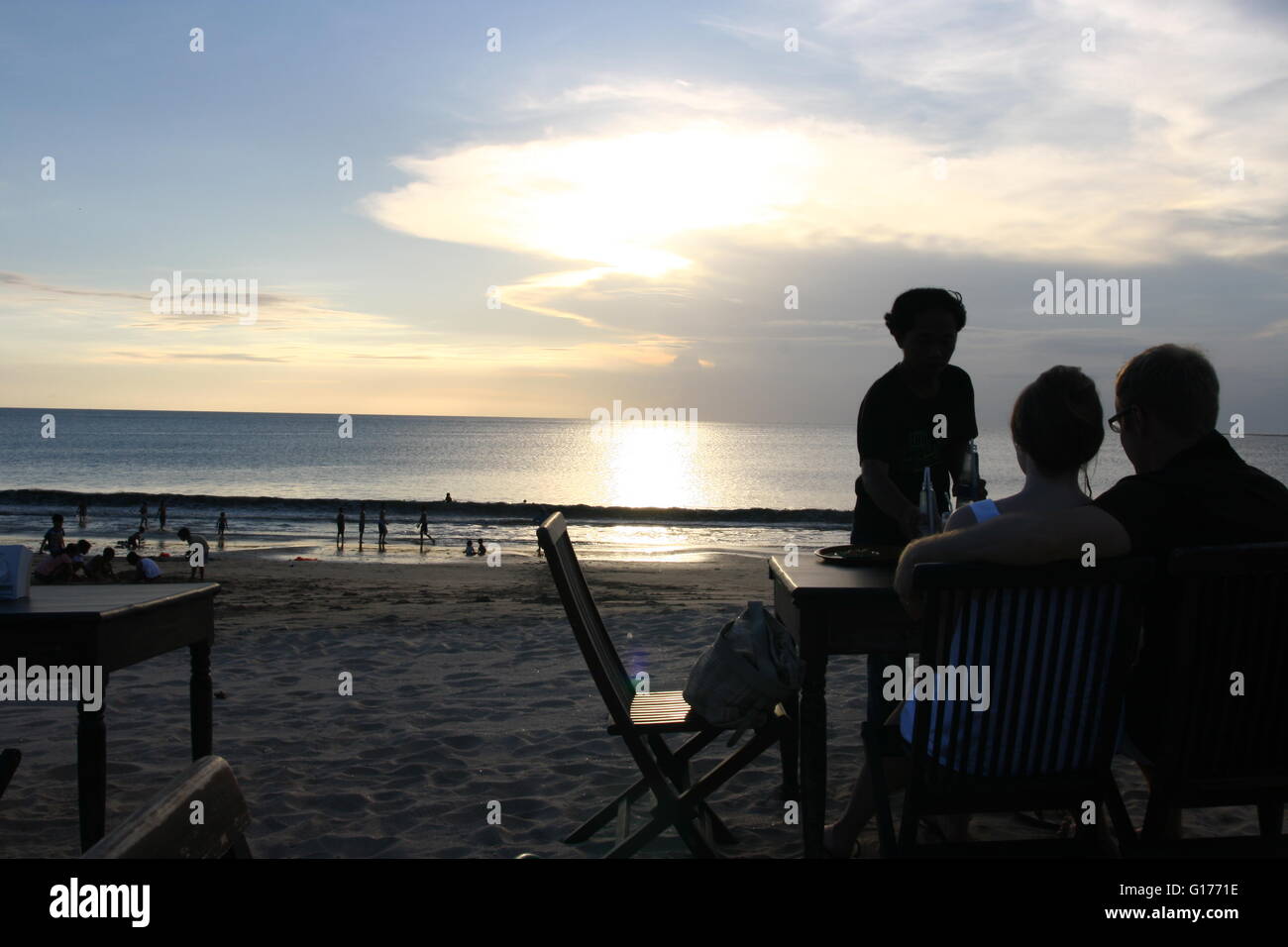 Romantic Sunset dinner at Jimbaran, Bali Stock Photo - Alamy