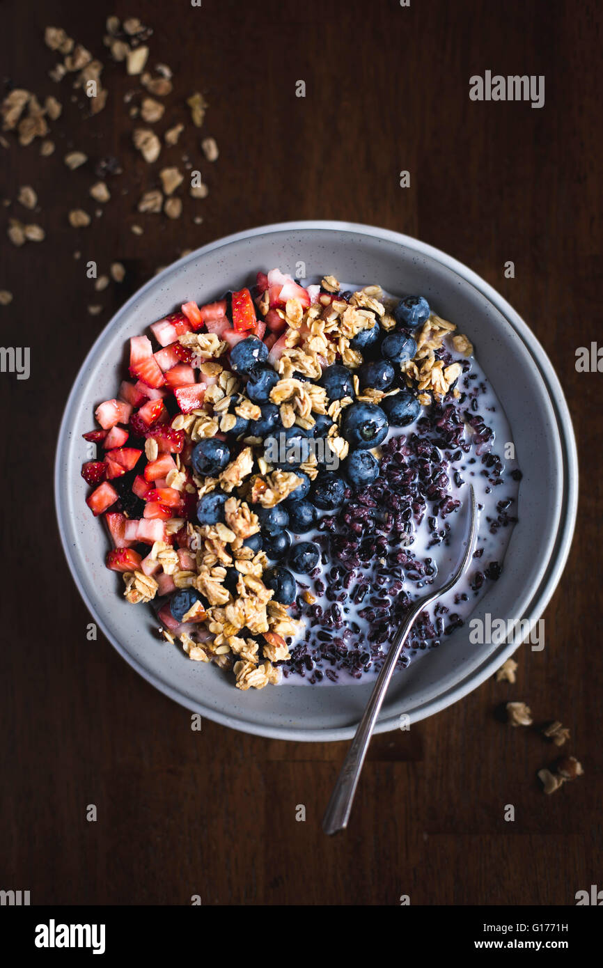 A bowl of Forbidden Rice Morning Cereal with Berries and granola is ...