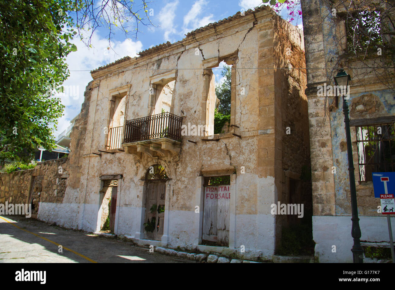 Facade of an abandoned house in Assos on the Greek ionian island ...