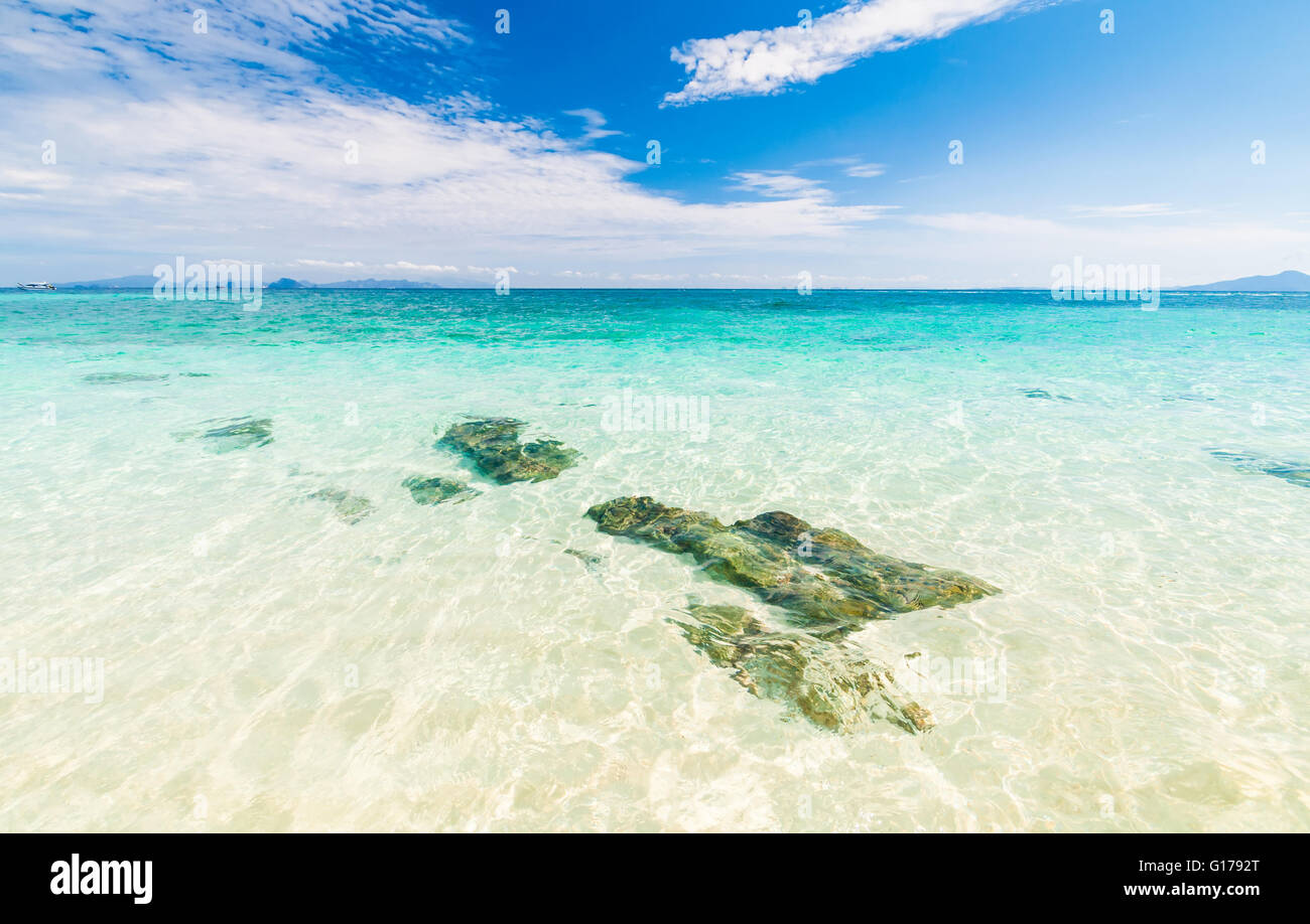 Rocks in beautiful turquoise crystal clear sea water Stock Photo - Alamy