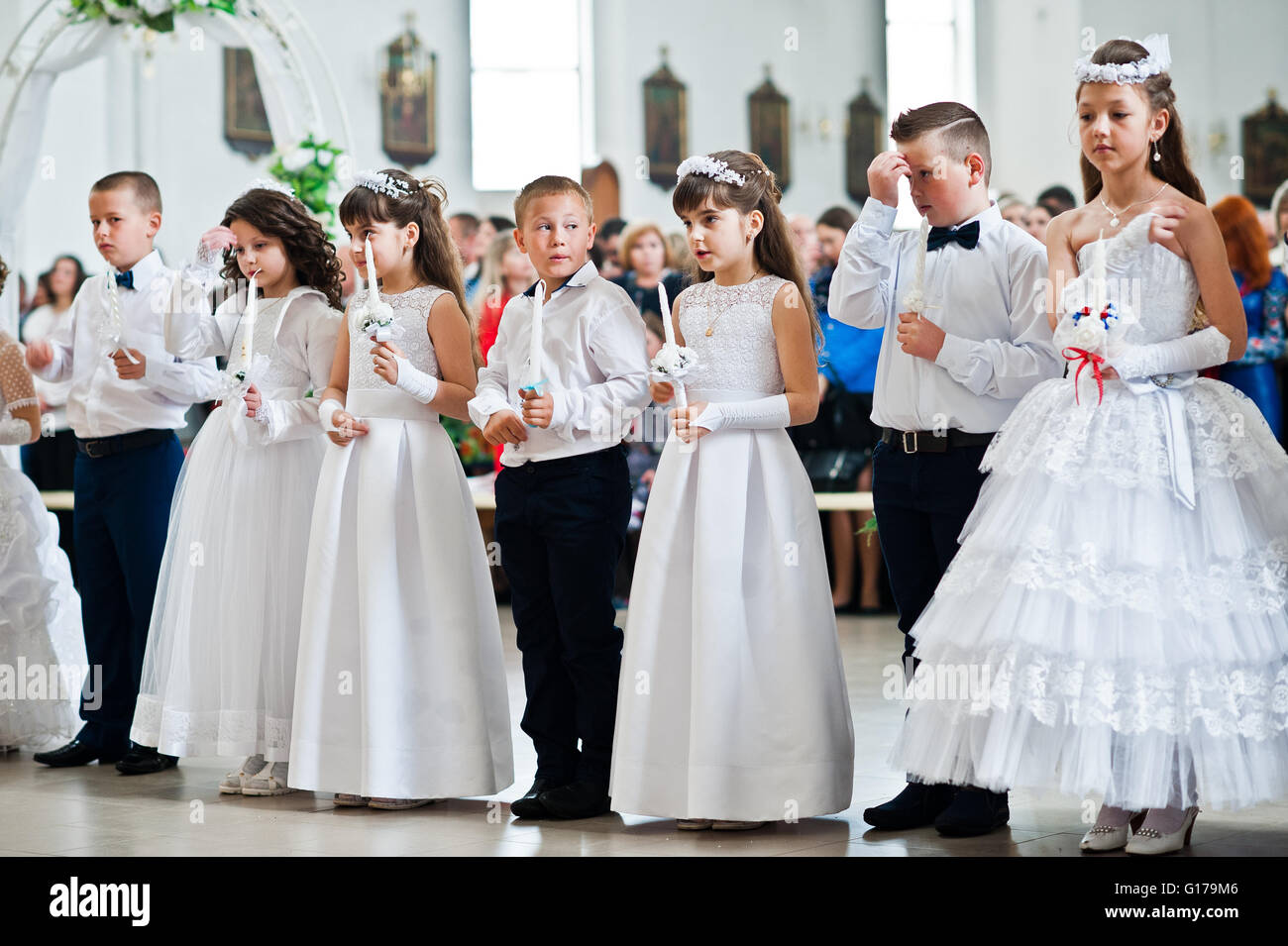 LVIV, UKRAINE - MAY 8, 2016: The ceremony of a First Communion in the ...