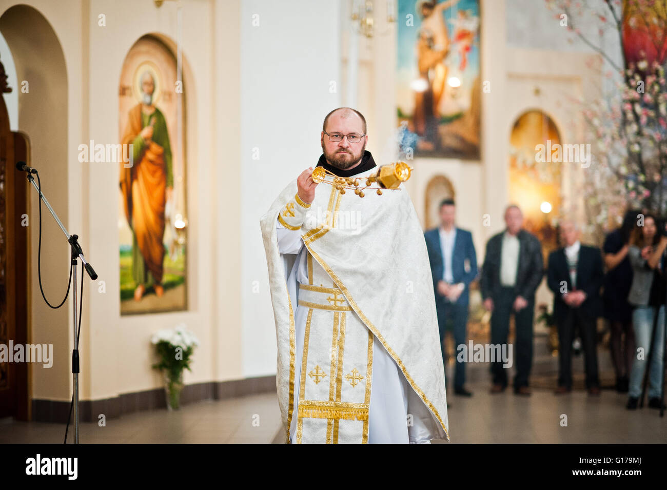 LVIV, UKRAINE - MAY 8, 2016: Priest with a censer at ceremony of a ...