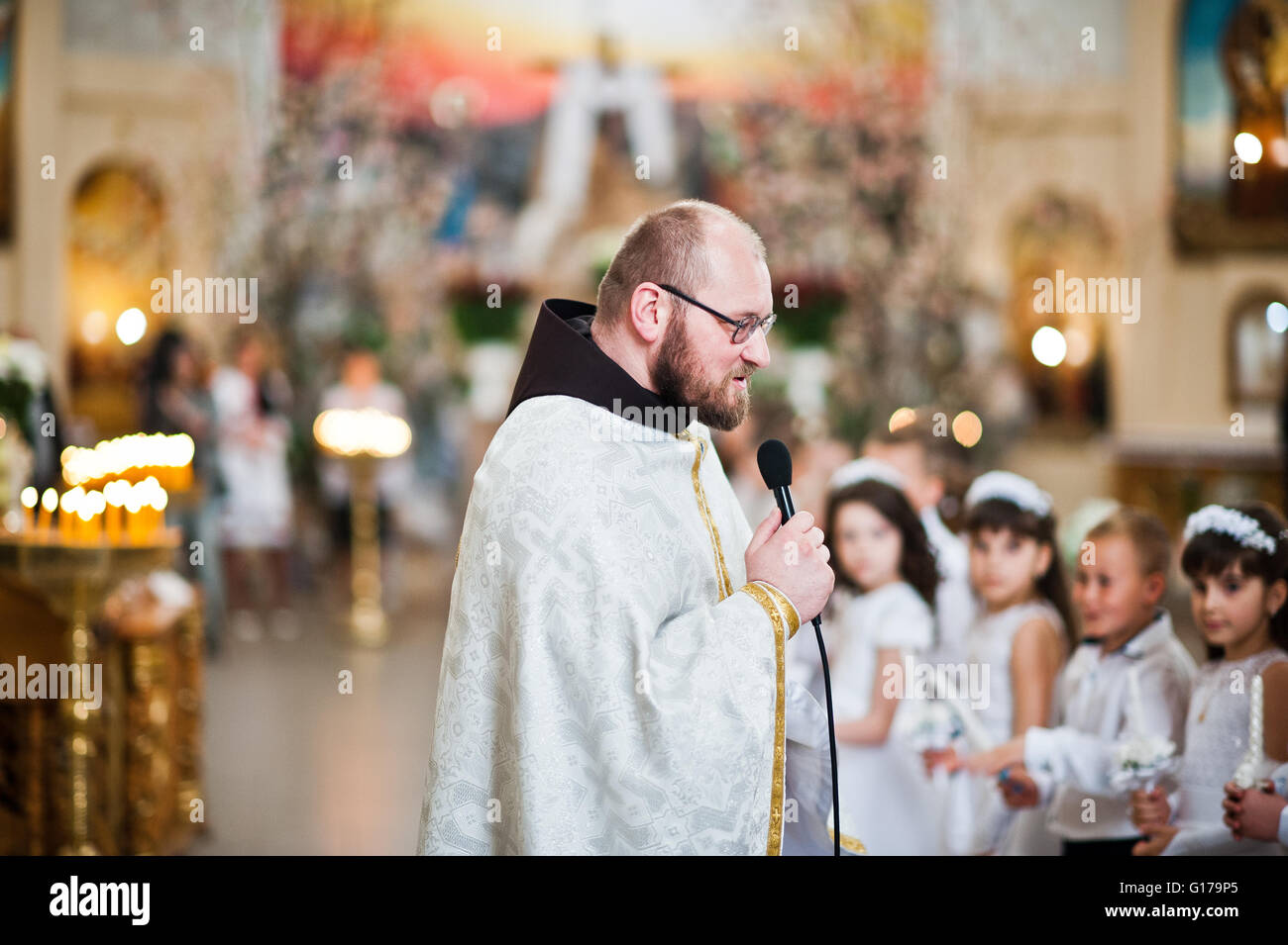 Communion in ukrainian catholic church hi-res stock photography and ...