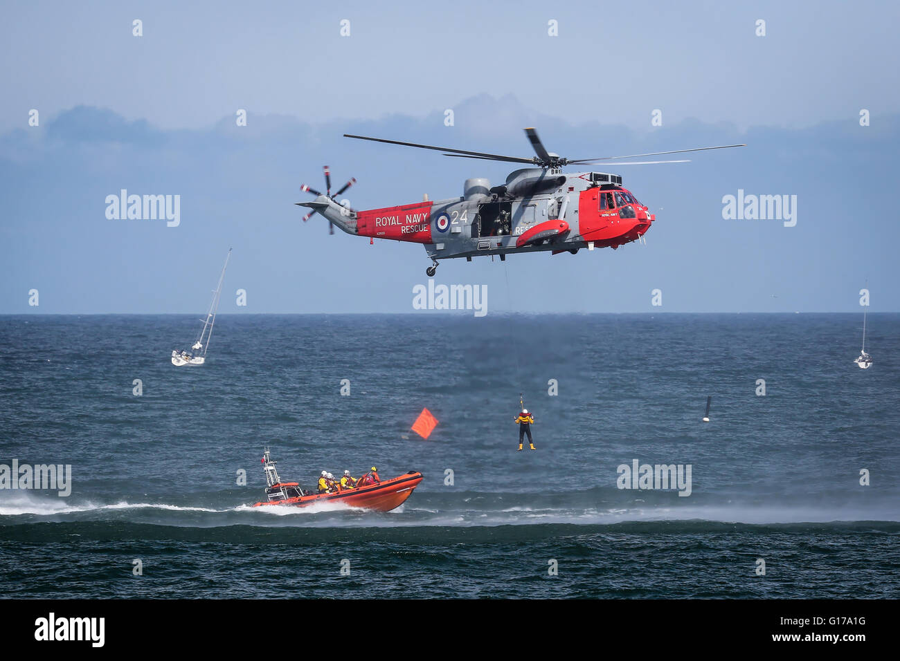 Helicopter performs rescue mission during air show Stock Photo - Alamy