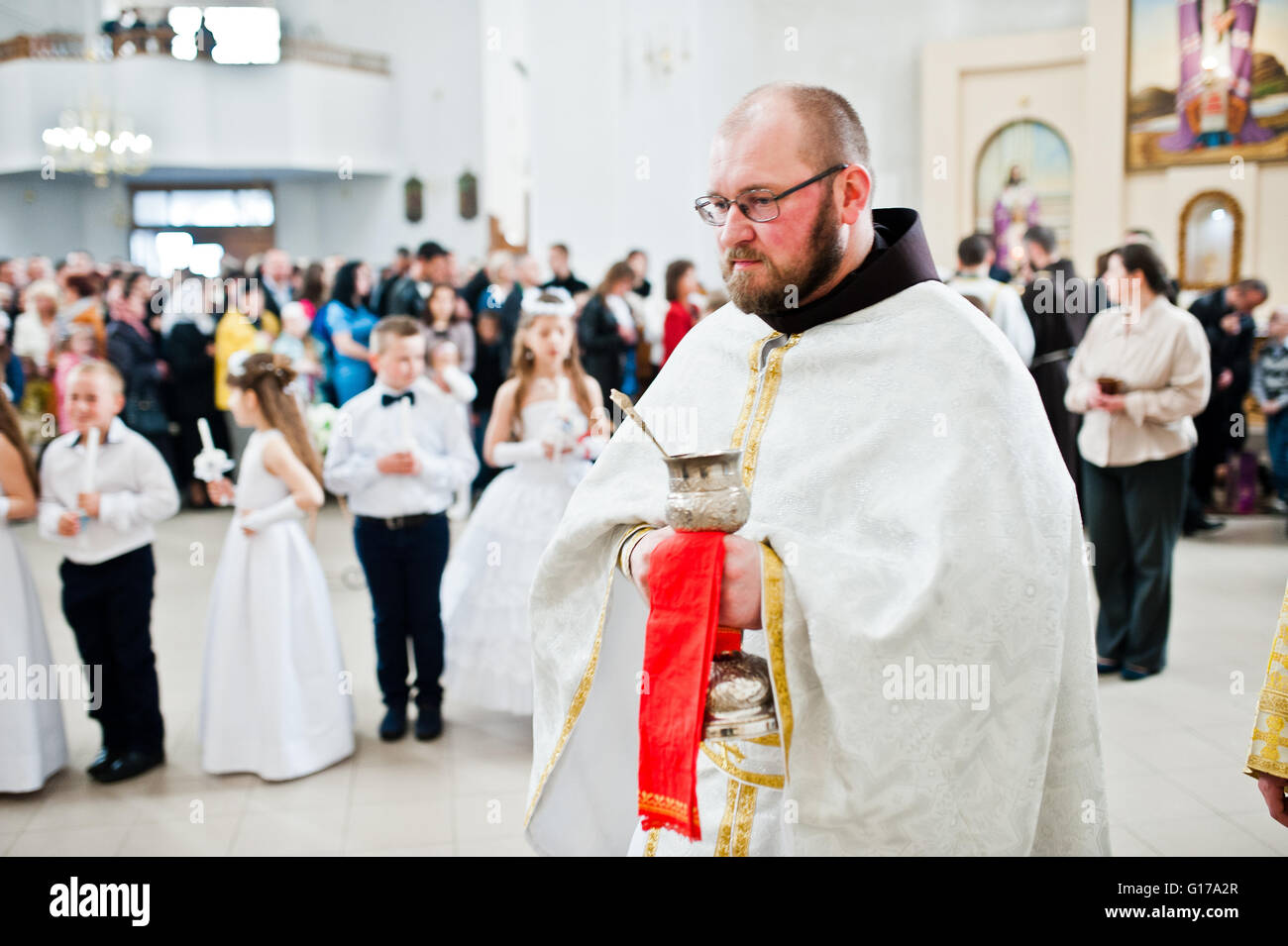 Communion in ukrainian catholic church hi-res stock photography and ...
