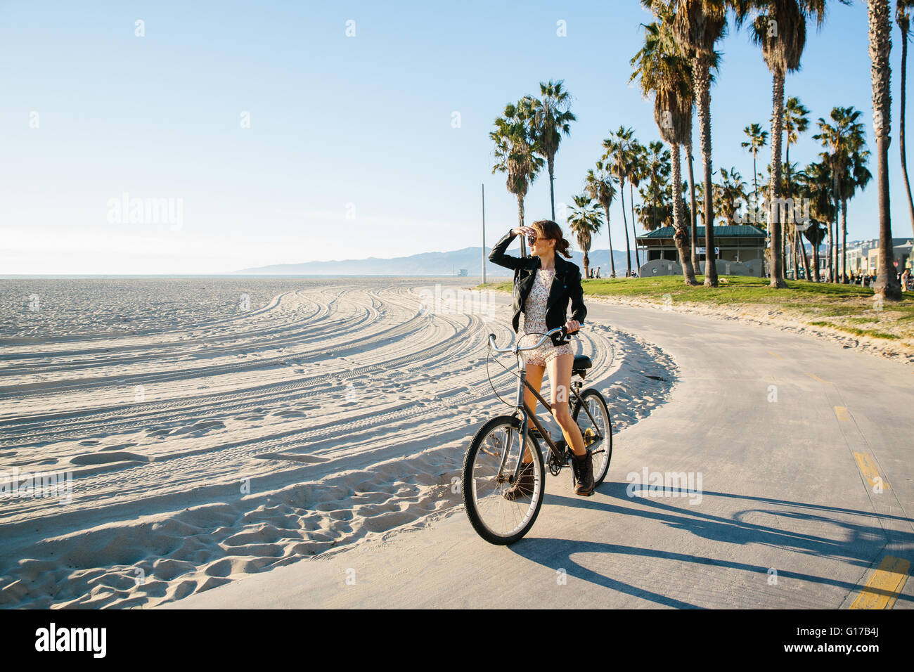 One woman cycling summer side view hi-res stock photography and images ...