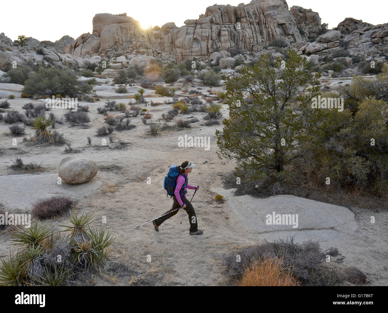 Hiker exploring Mojave Desert, Joshua Tree National Park, California ...