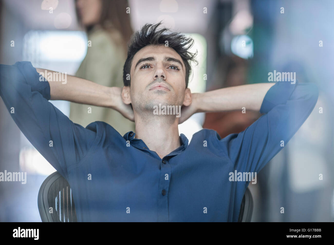 People sitting behind hi-res stock photography and images - Alamy