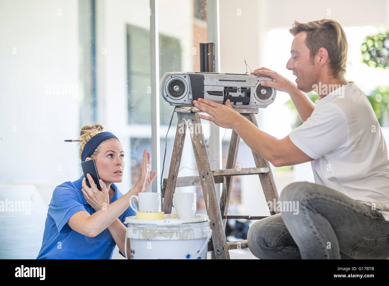 Woman making telephone call, hand gesture requesting silence Stock ...