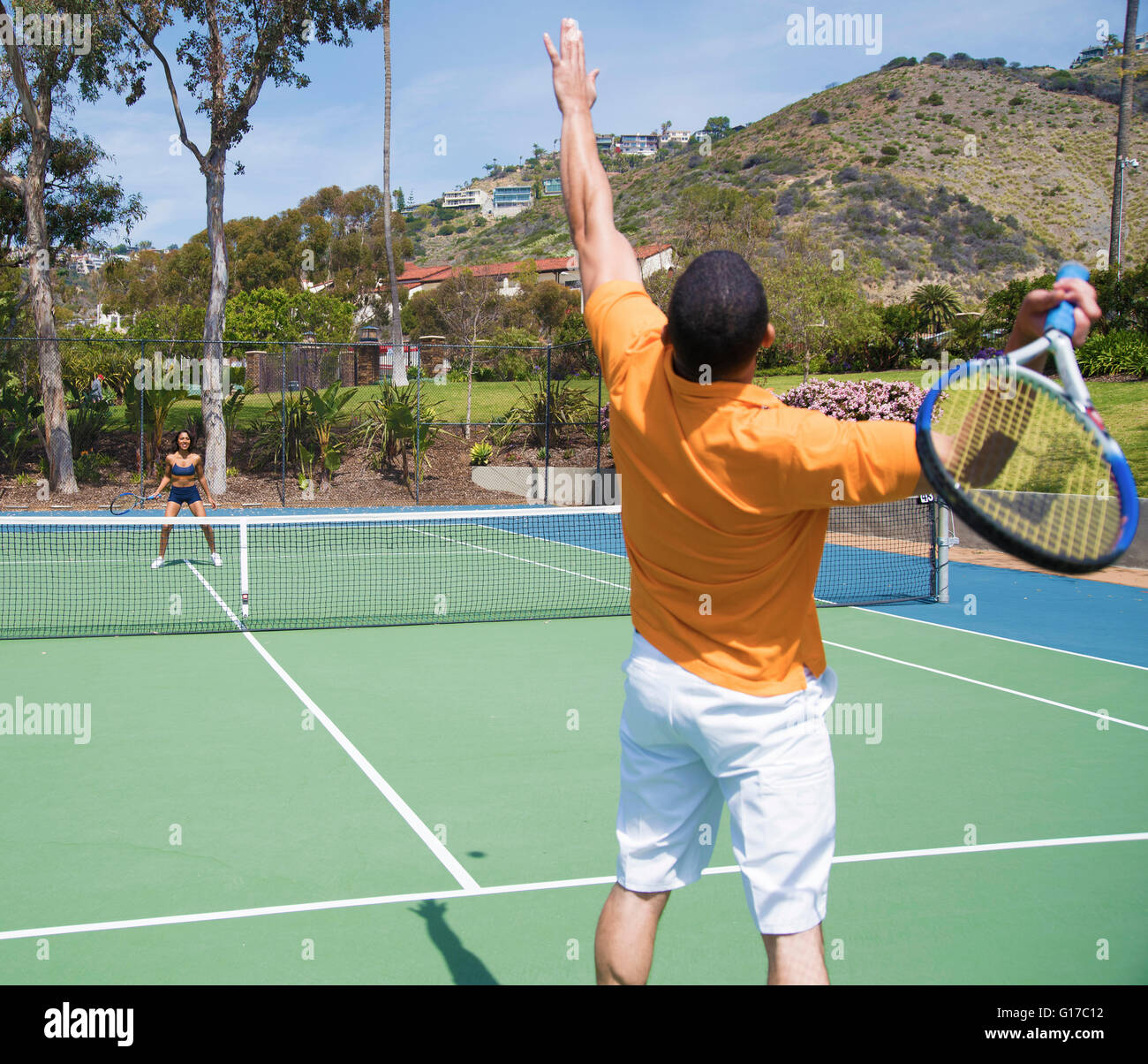 Playing tennis hi-res stock photography and images - Alamy