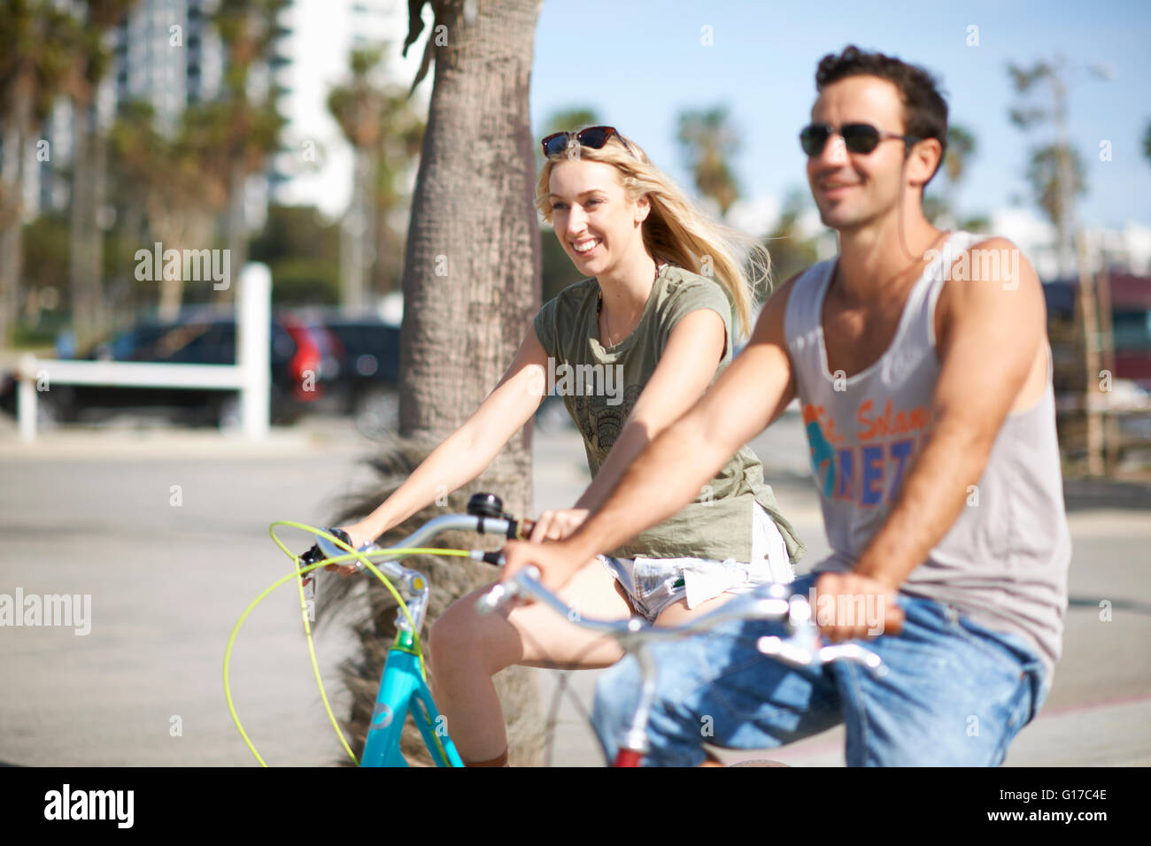 Couple cycling together hi-res stock photography and images - Alamy