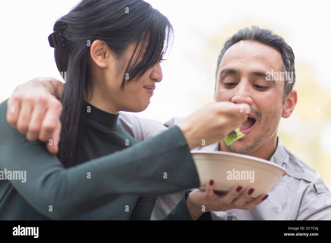 Man feeding woman hi-res stock photography and images - Alamy