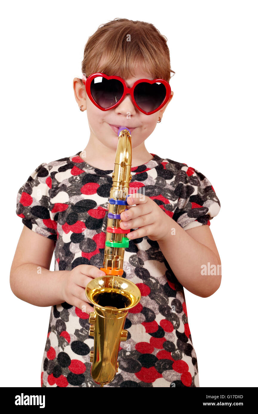 little girl playing music on saxophone Stock Photo - Alamy