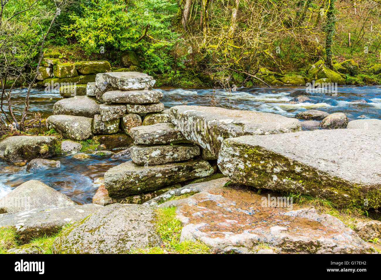 Rocks and flowing water in the River Dart in Devon, UK Stock Photo - Alamy