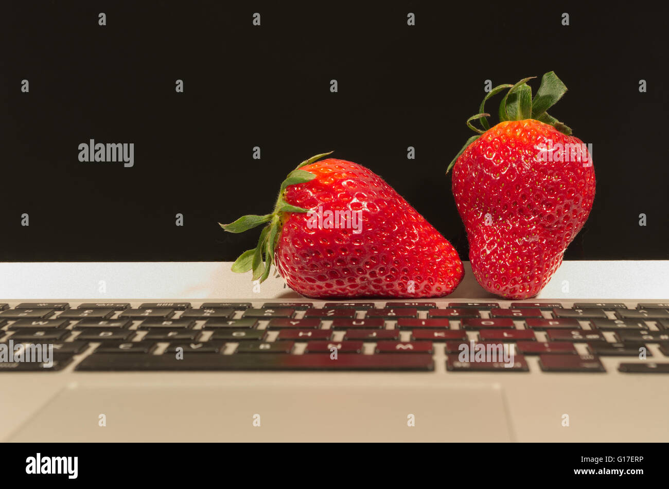Just another fruit meets high-tech Stock Photo - Alamy