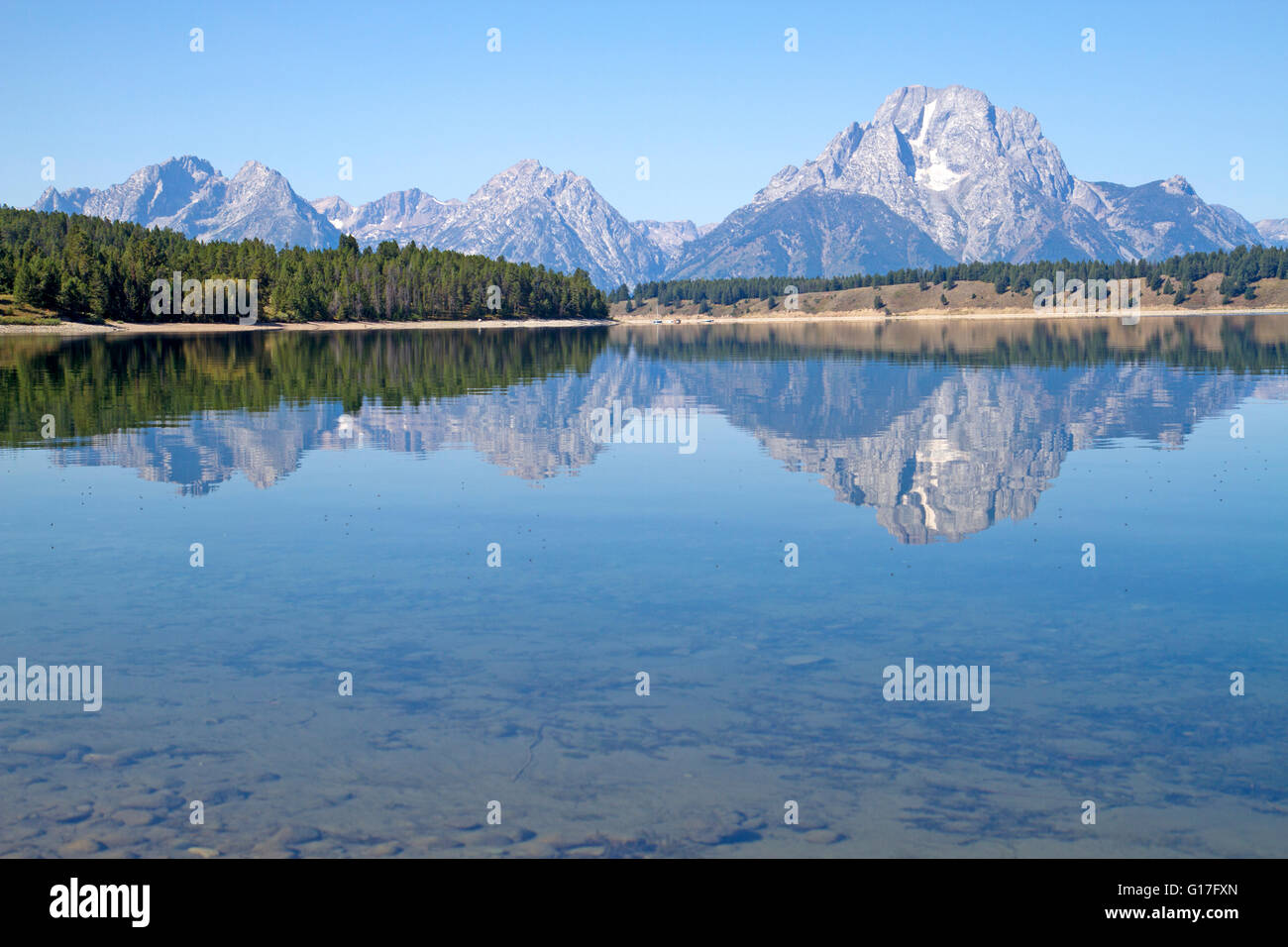 Reflections of the Teton Range in Jackson Lake Stock Photo - Alamy