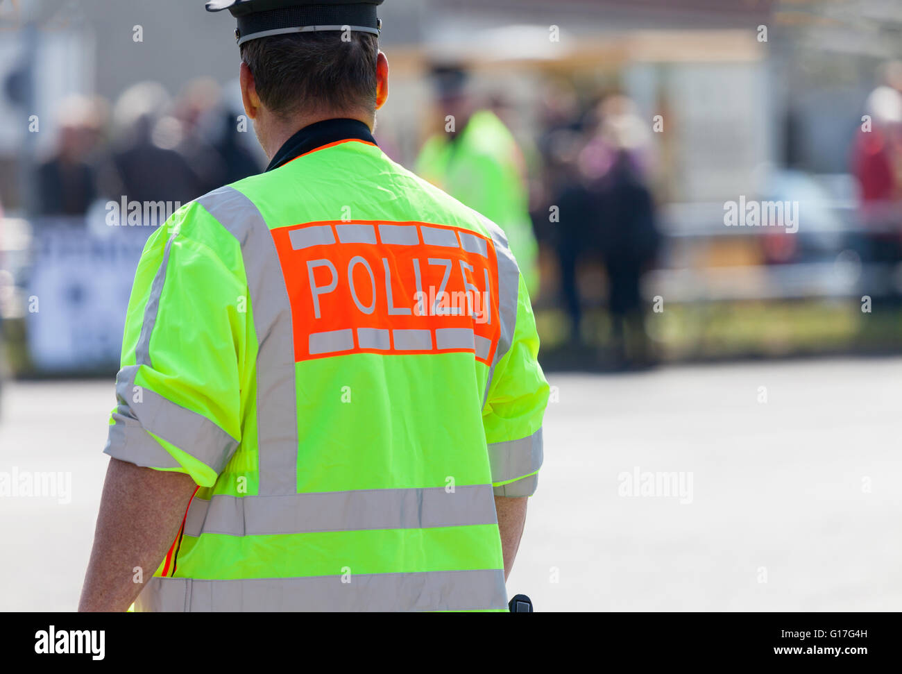 german policeman stands on a street Stock Photo - Alamy
