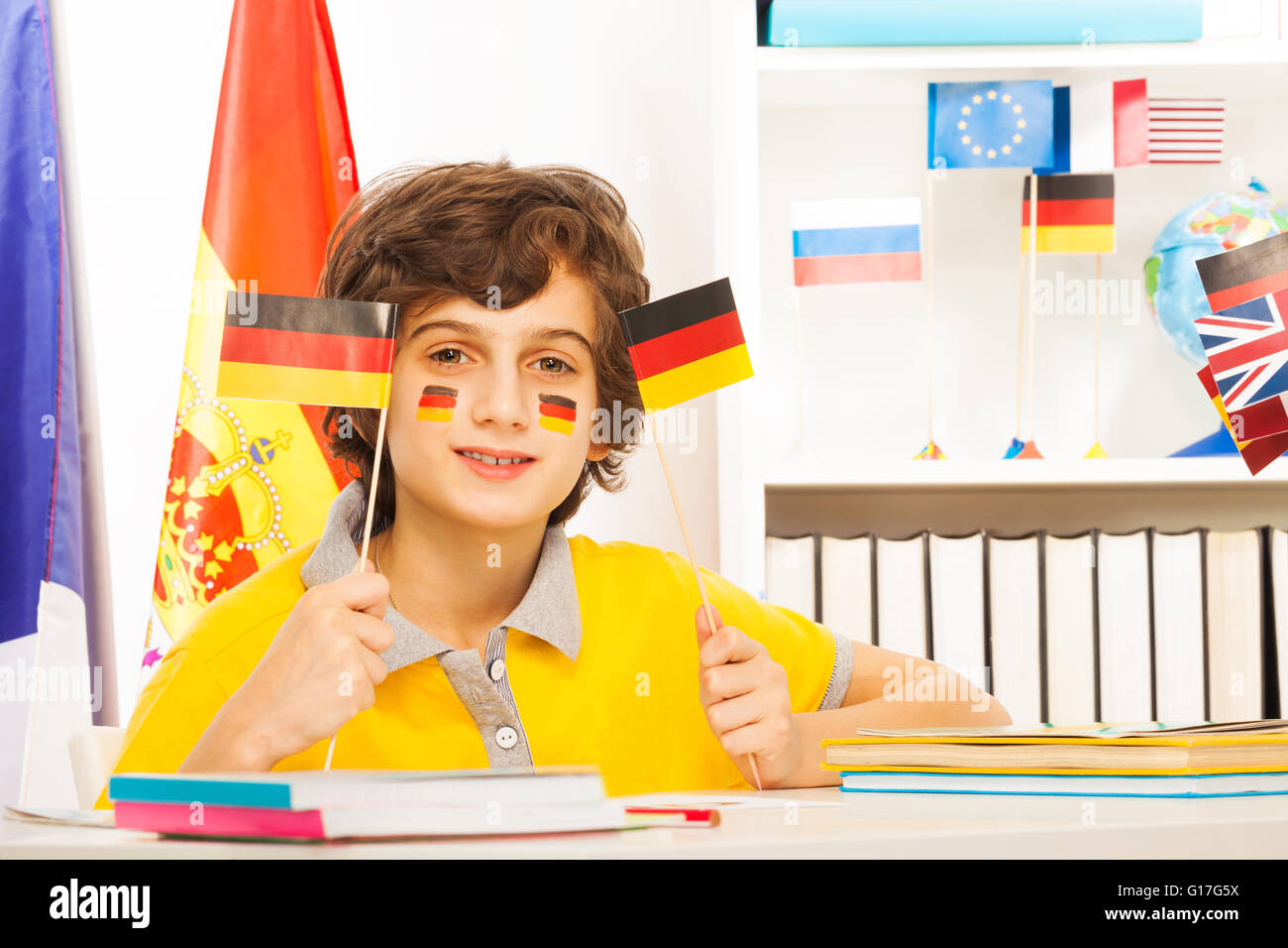 Child holding flags hi-res stock photography and images - Alamy
