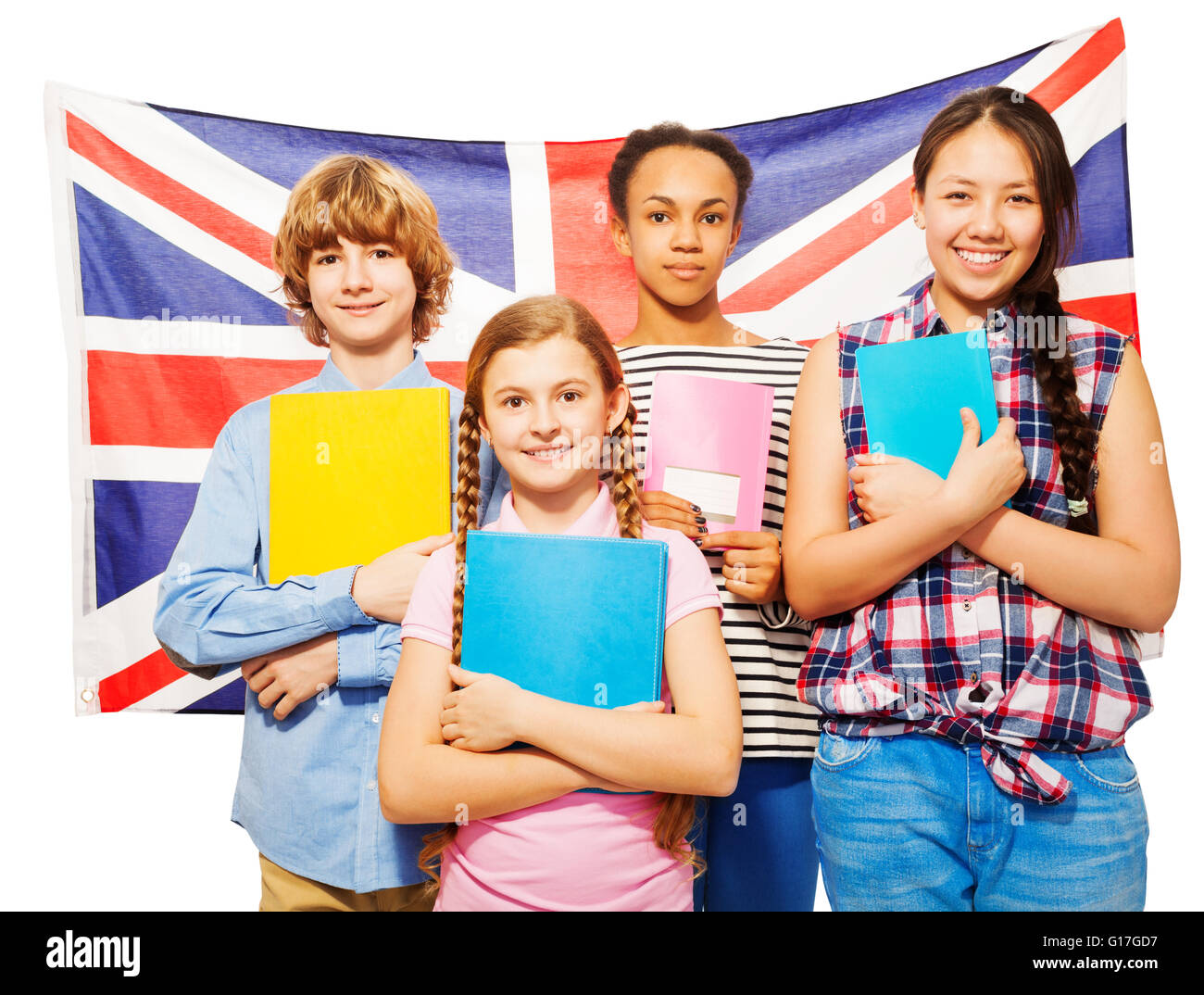 Four happy students standing against British flag Stock Photo - Alamy