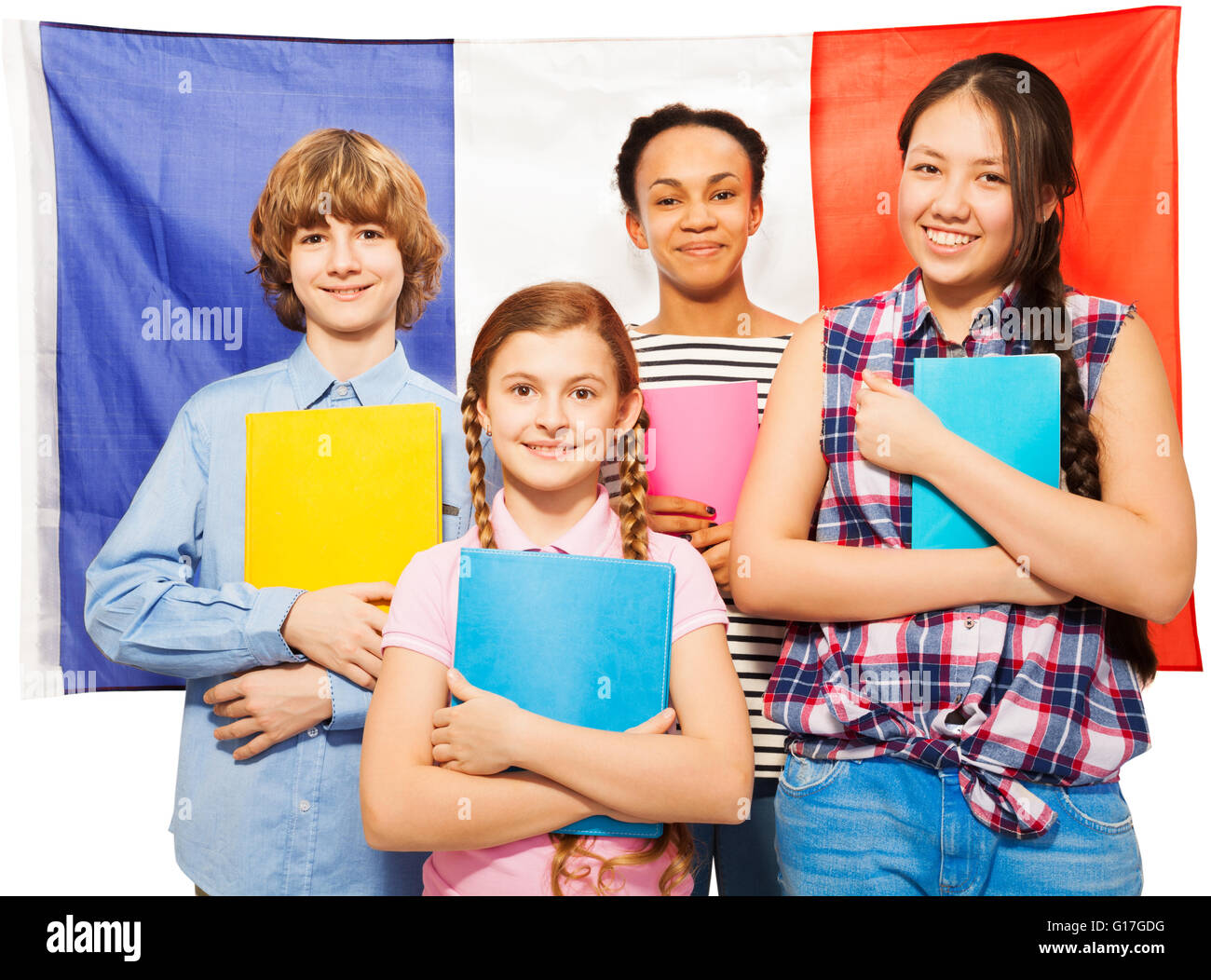 Happy French teenage students with textbooks Stock Photo - Alamy