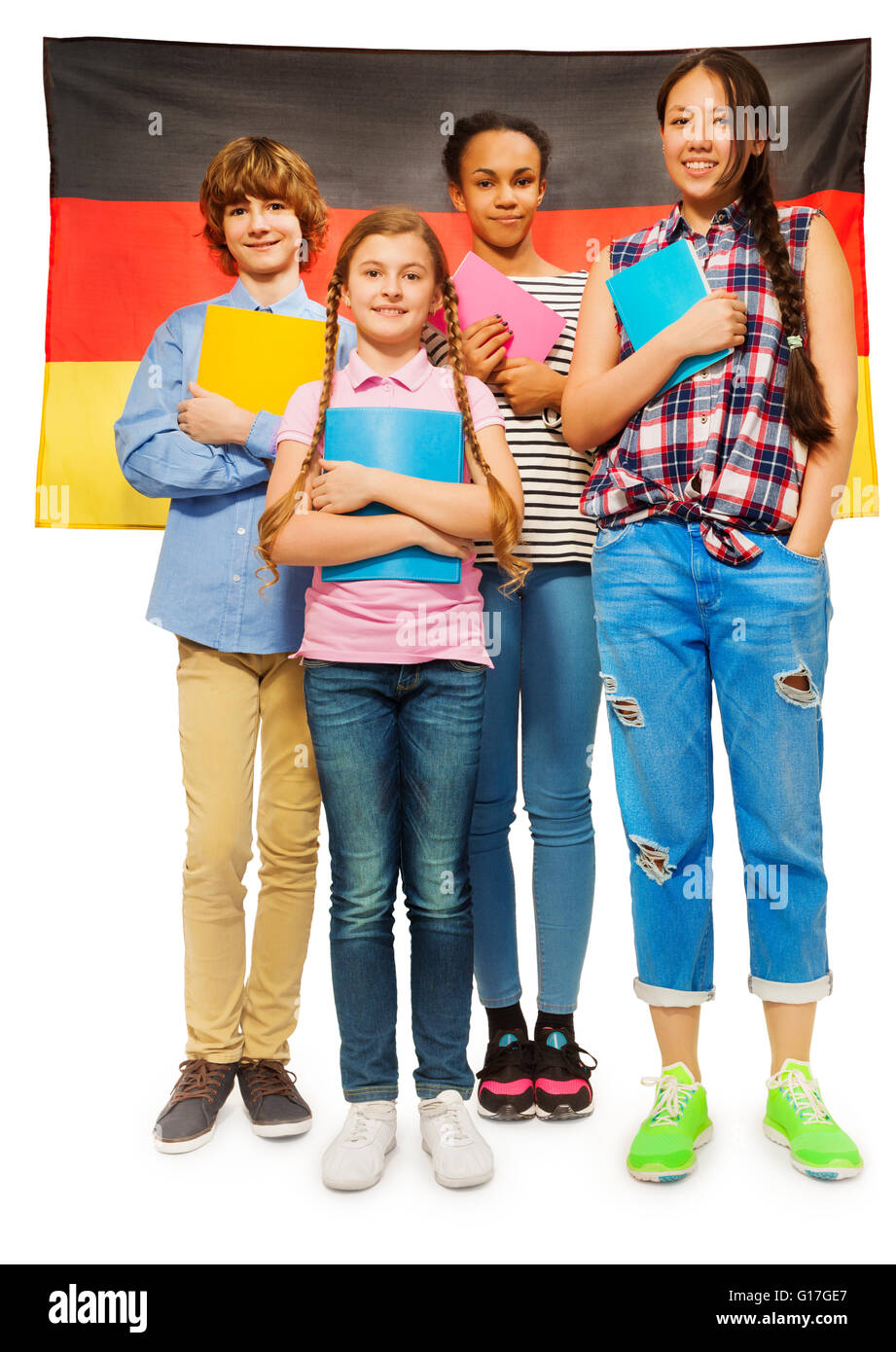 Whole-length picture of kids against German flag Stock Photo - Alamy