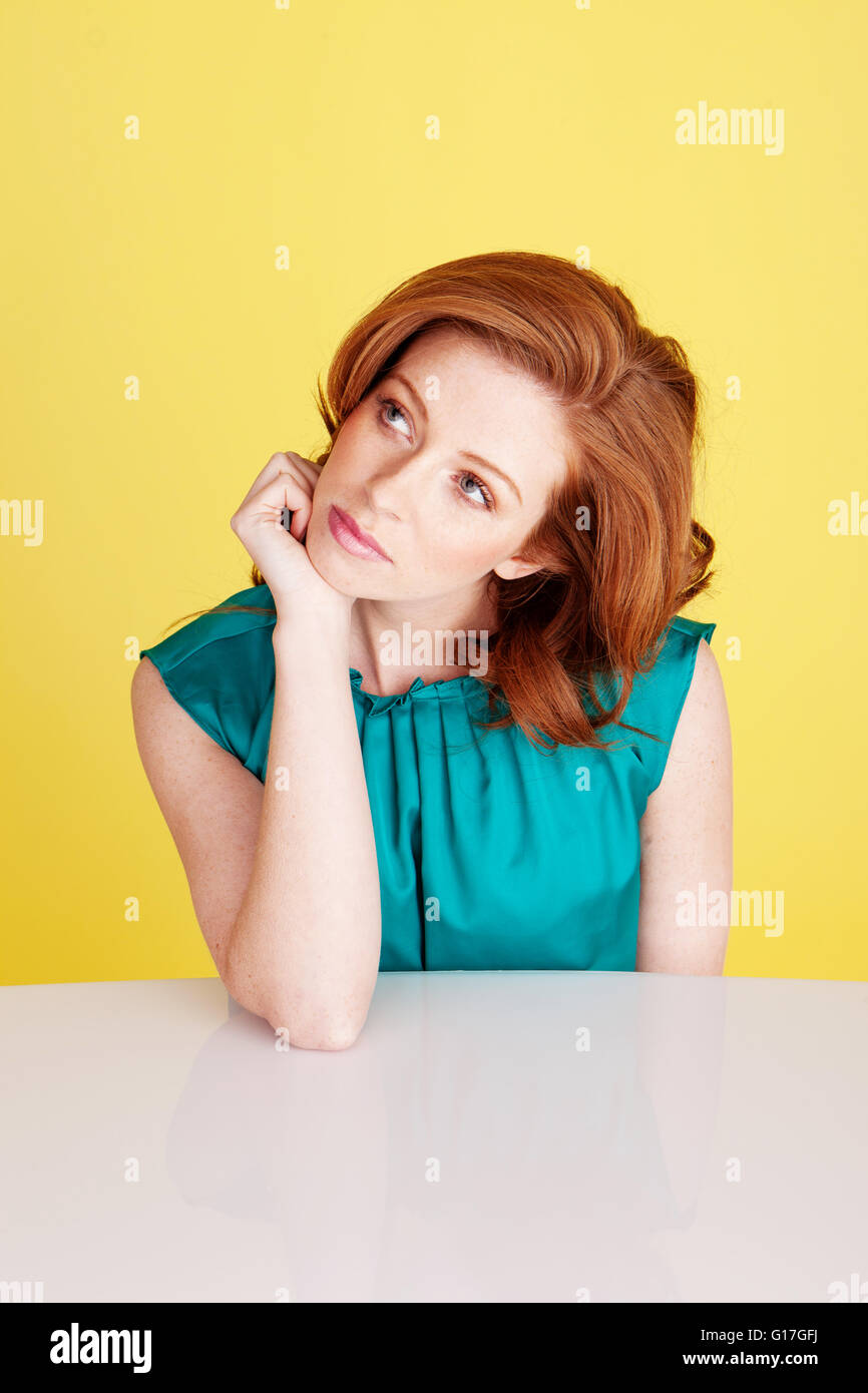 Beautiful Redhead Woman Thinking Stock Photo - Alamy