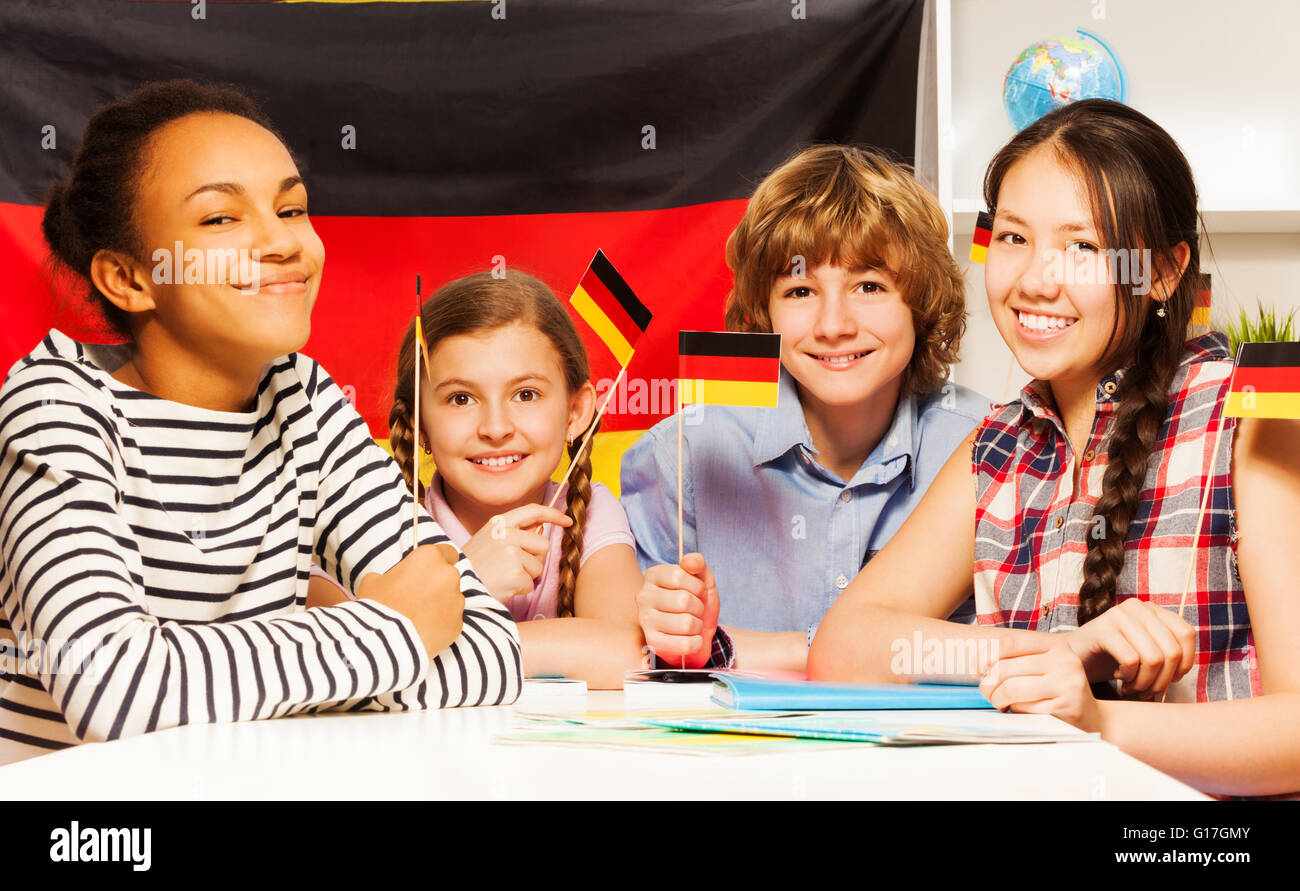 Happy multiethnic students at the language courses Stock Photo - Alamy