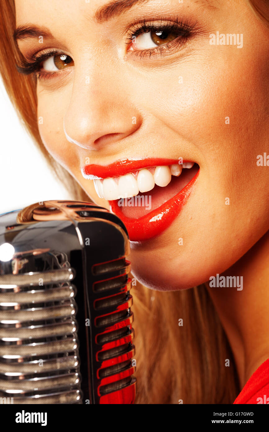 Beautiful portrait of woman with retro microphone Stock Photo - Alamy