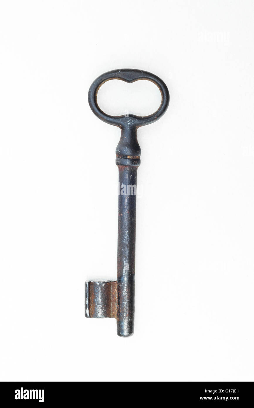 Old iron key on an isolated white background Stock Photo - Alamy