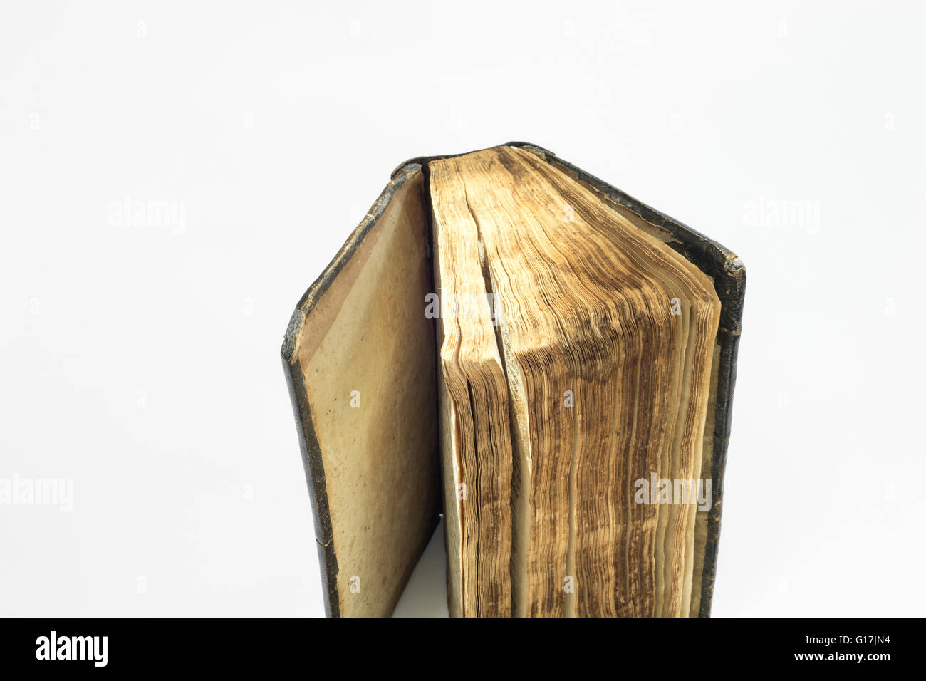 Detail of pages of old ancient book with isolated white background ...