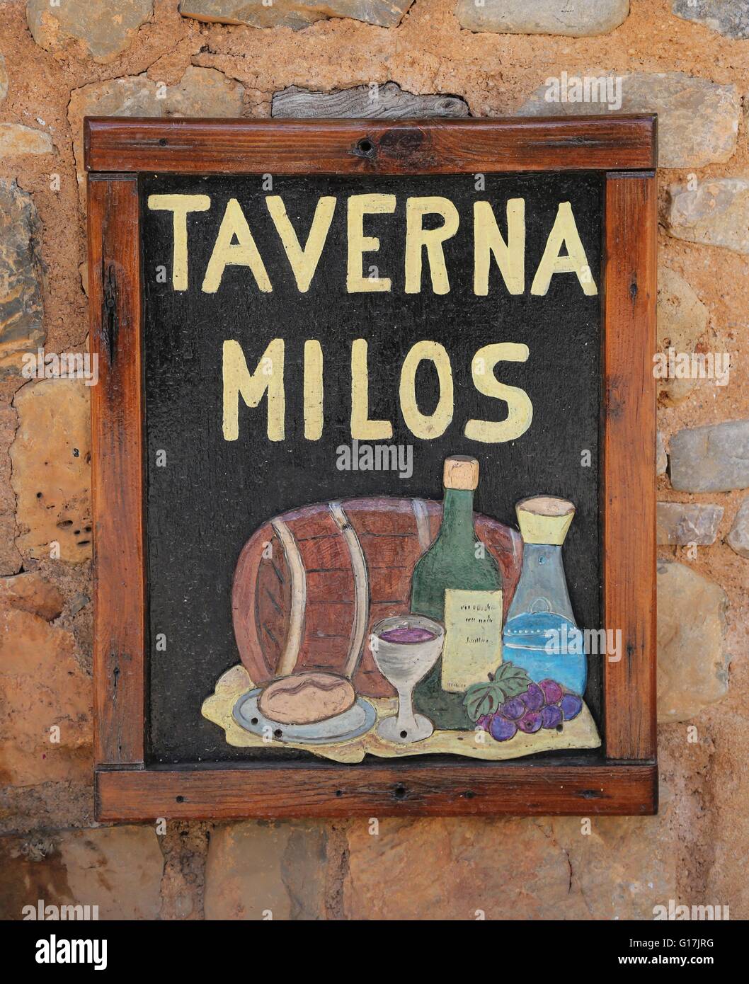 Family run Taverna Milos sign in Old Malia on Crete Stock Photo - Alamy