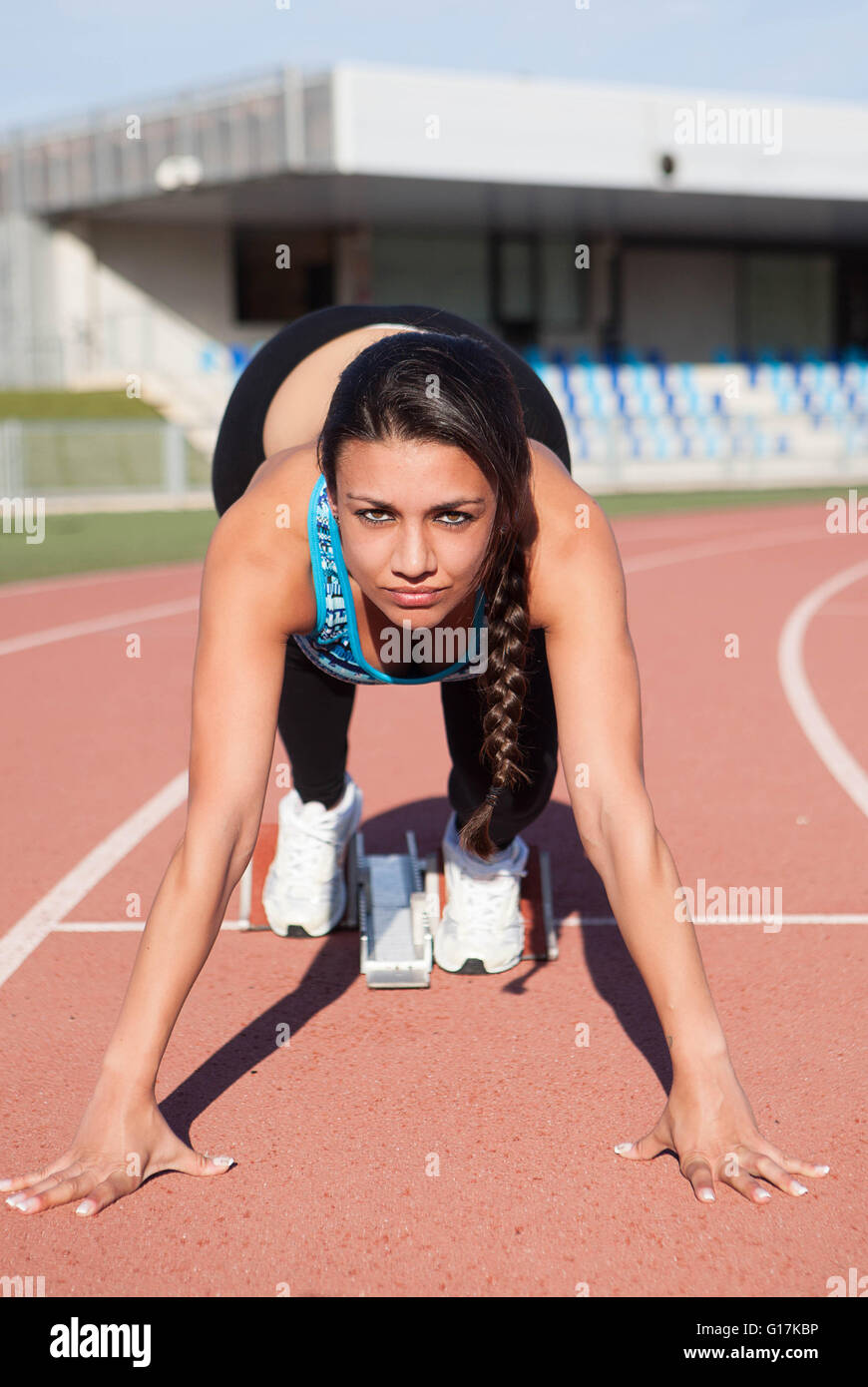 Woman running track hi-res stock photography and images - Alamy
