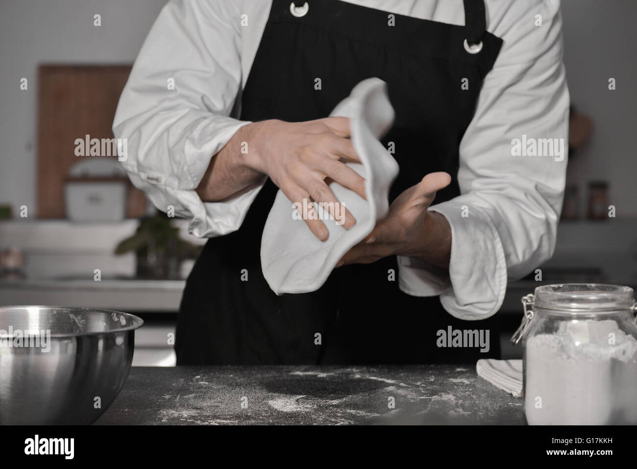 Chef cooking pizza in kitchen with hands Stock Photo - Alamy