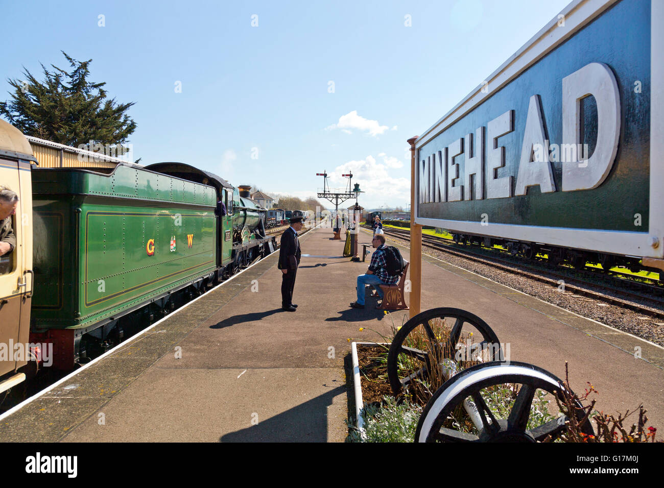 An ex-GWR steam locomotive 6960 'Raveningham Hall' at Minehead station ...