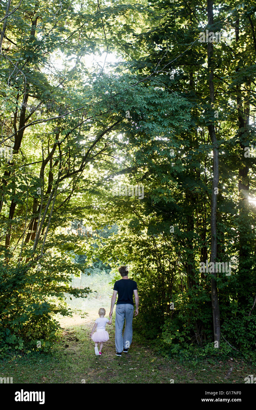 Father daughter holding hands rear view hi-res stock photography and ...