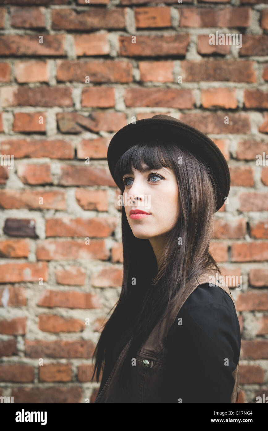 Beautiful young woman outdoors brick hi-res stock photography and ...