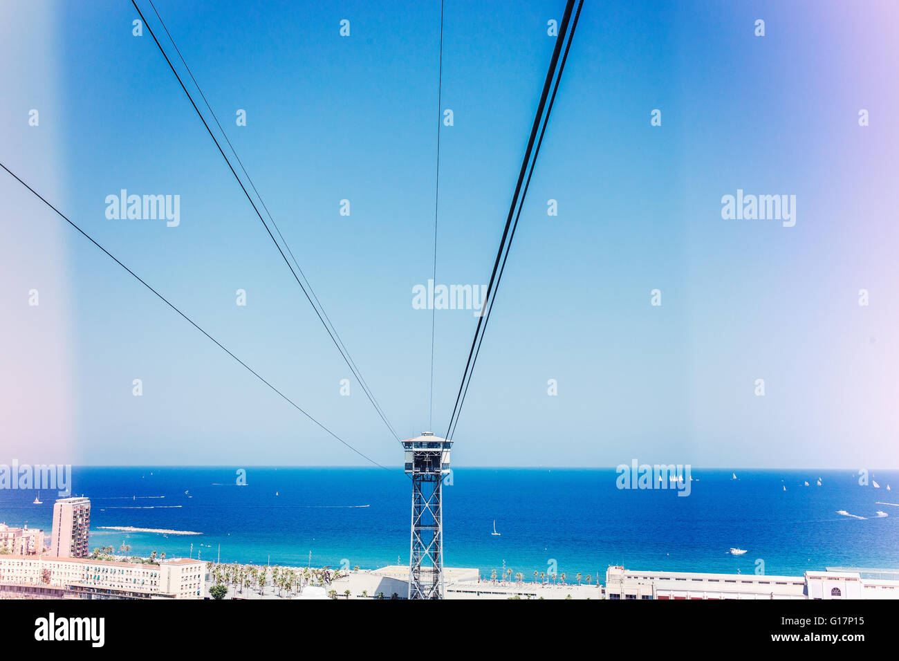Elevated cable car view of blue sky and sea, Barcelona, Spain Stock ...