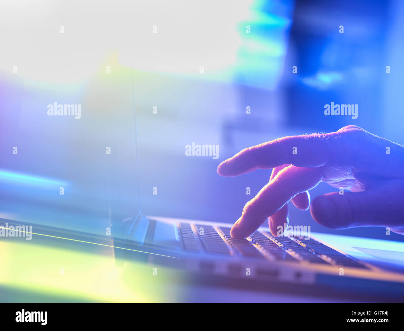 Online working man typing hi-res stock photography and images - Alamy