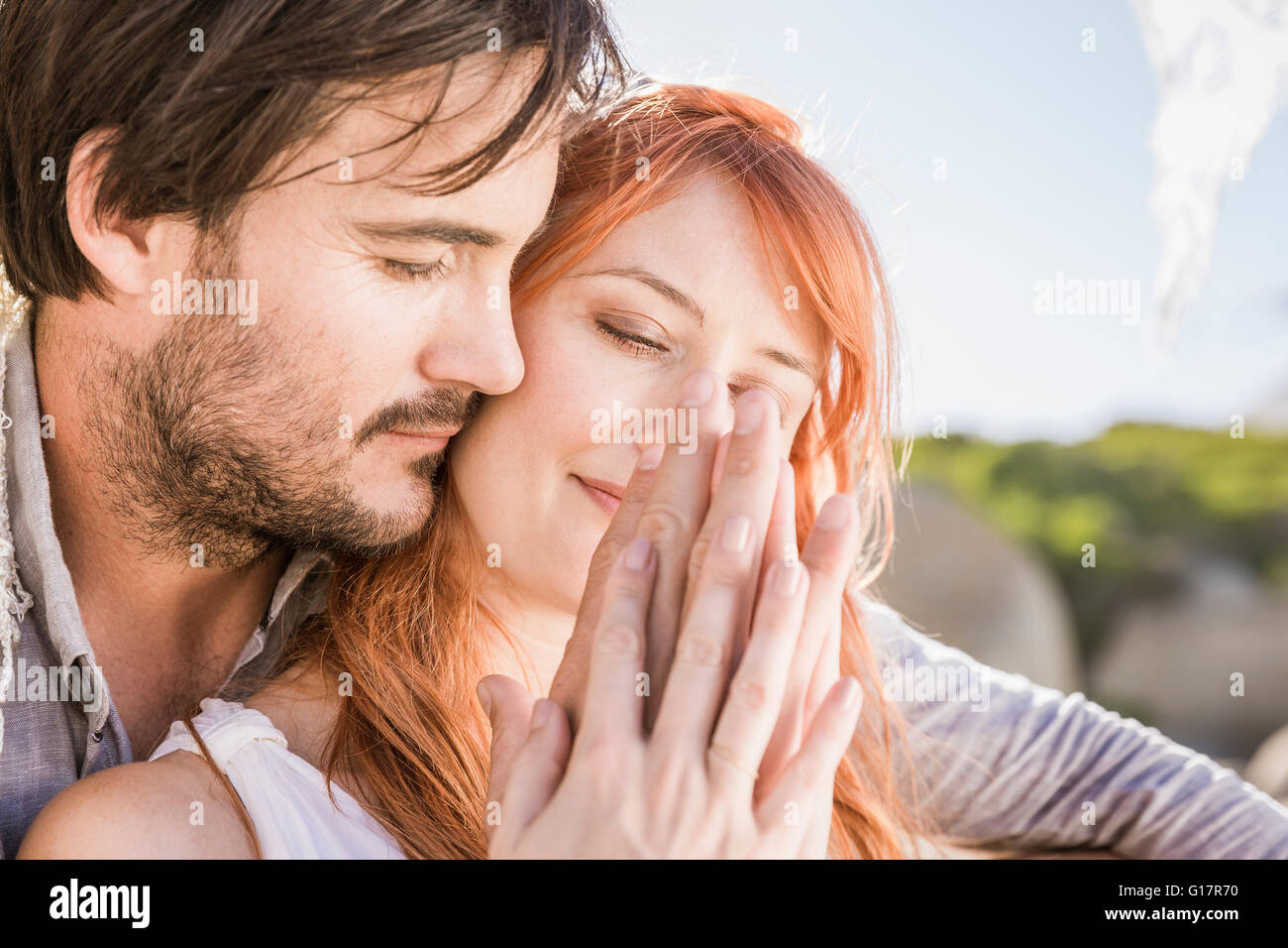 Couple behind holding hands hi-res stock photography and images - Alamy