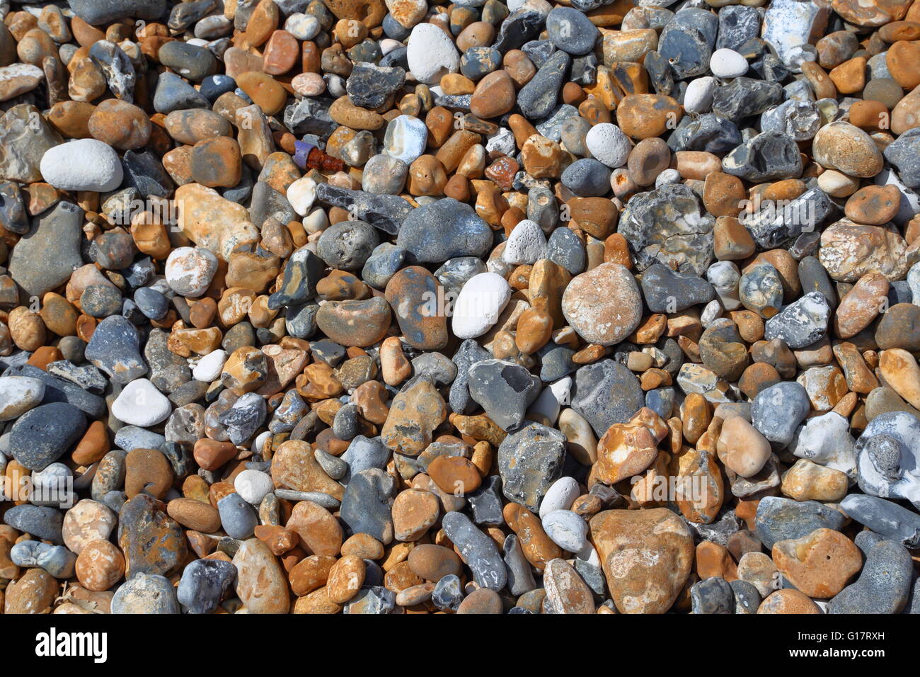 Backdrop of pebbles by the seaside Stock Photo - Alamy