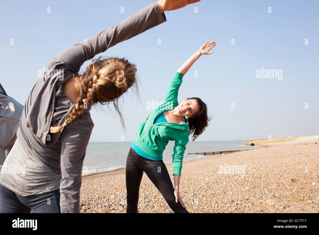 Two bending over hi-res stock photography and images - Alamy