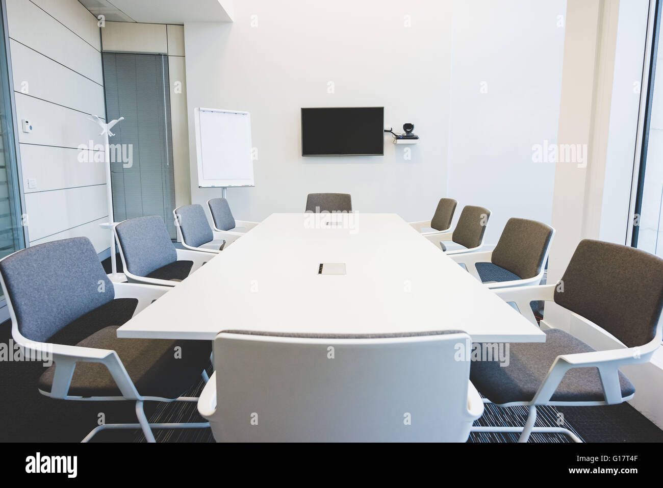 Empty conference table in office boardroom Stock Photo - Alamy