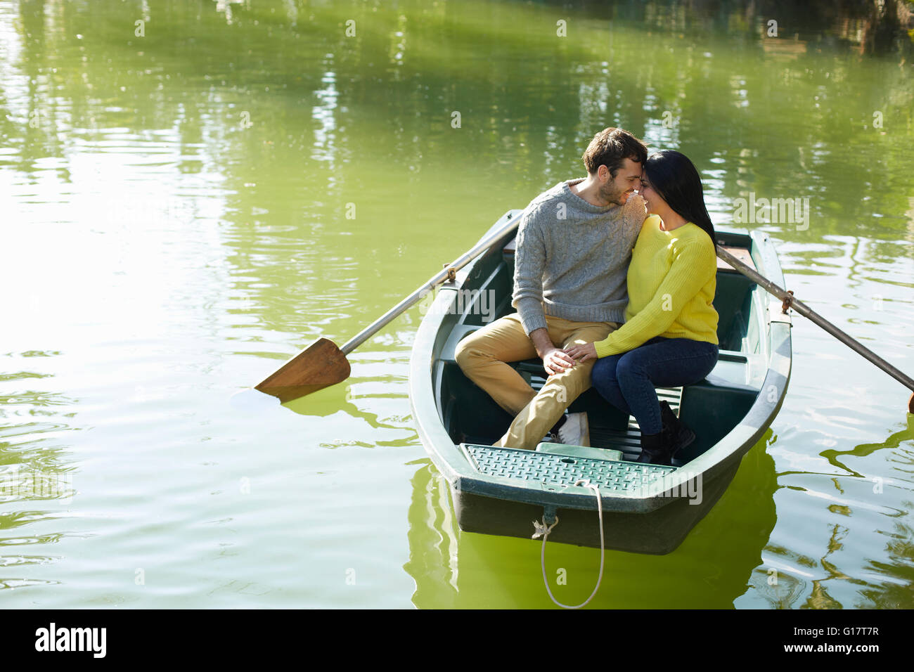 Couple rowing hugging hi-res stock photography and images - Alamy