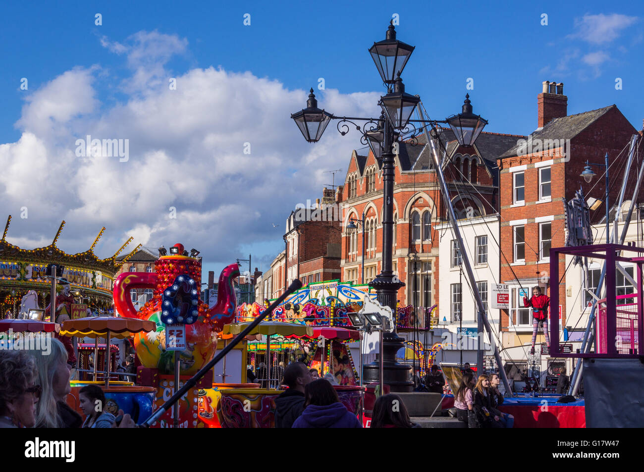 Carousel and teacup rides at the May Fair, Market Place, Boston ...