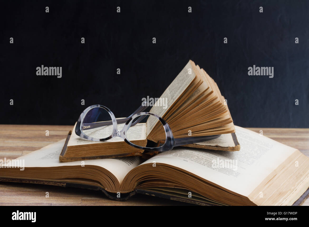 Books and glasses Stock Photo - Alamy
