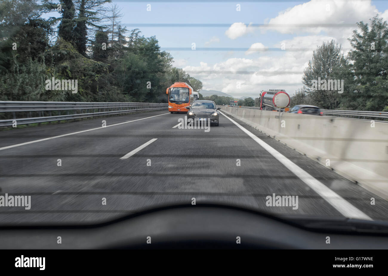 The motorway traffic from the rear window Stock Photo - Alamy