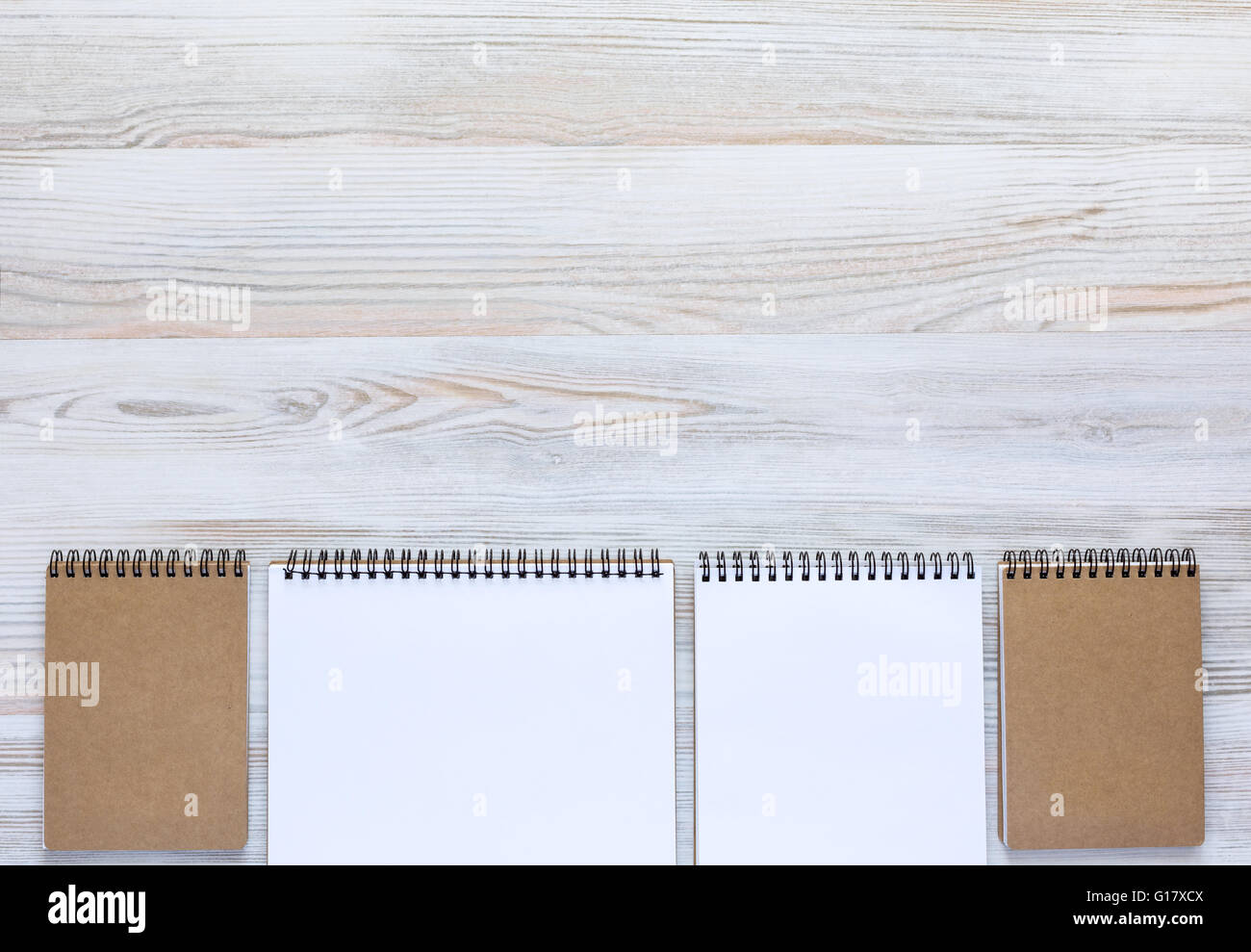 Natural Wood Background with Line of Notepads Stock Photo - Alamy