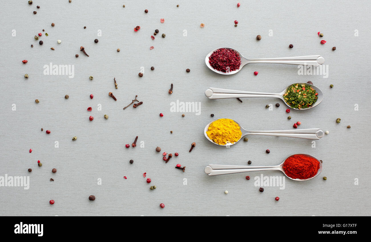 Variety of Eastern Spices in Silver Spoons Stock Photo - Alamy